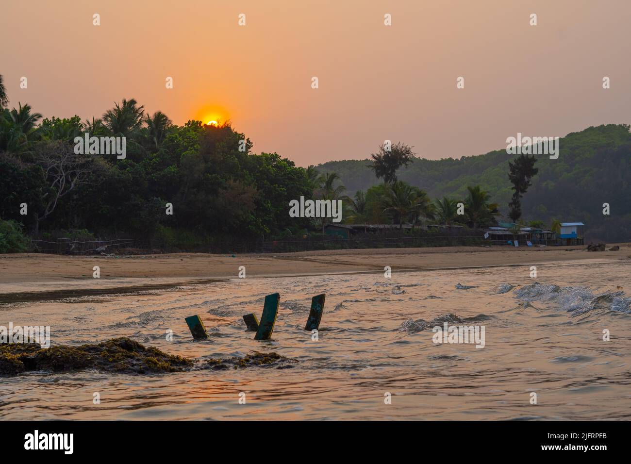 Beautiful sunrise at om beach in gokarna.palm trees at seashore Stock ...