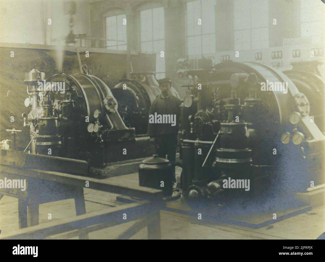 The engine room in the power plant Stock Photo - Alamy