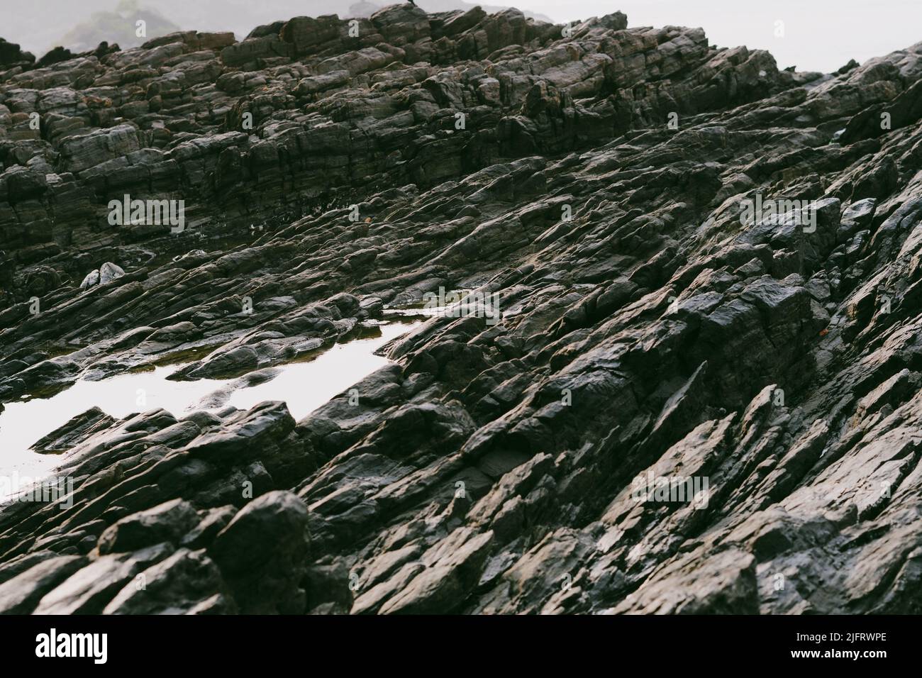 Sharp rock mountains close up view and water in rocks Stock Photo - Alamy