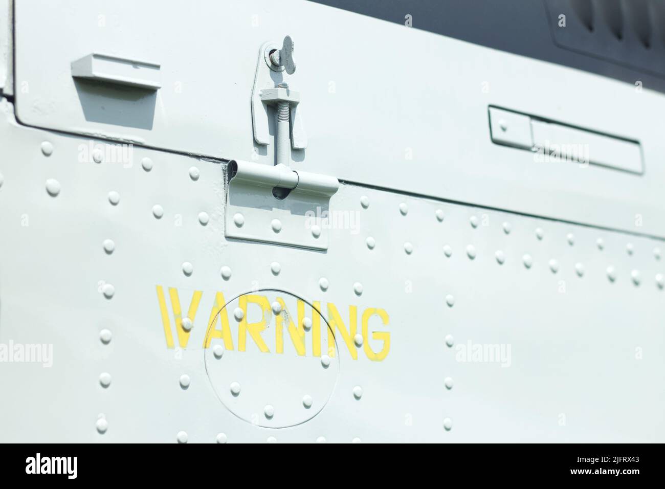 Danger warning sign decal on an old aircraft Stock Photo - Alamy