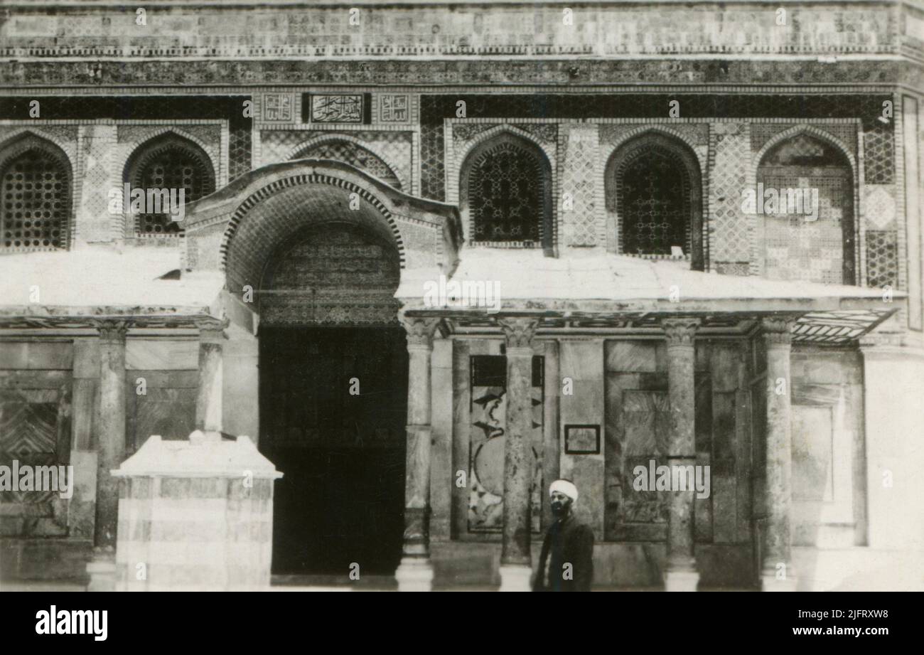 The Imam standing in front of the main entrance of ‘The Dome of the ...