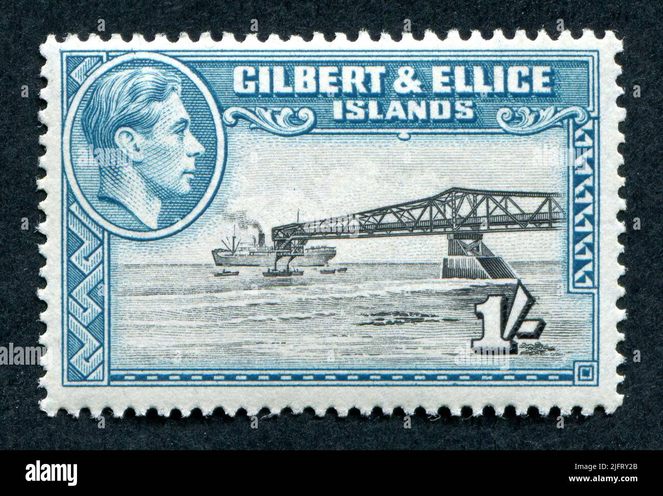 A 1939 issue 1s Gilbert & Ellice Islands ‘Colonial Motifs’ postage stamp featuring King George ...