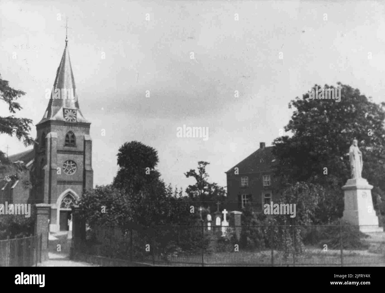 St. Remigius Church with parsonage; On the right the Sacred Heart image ...