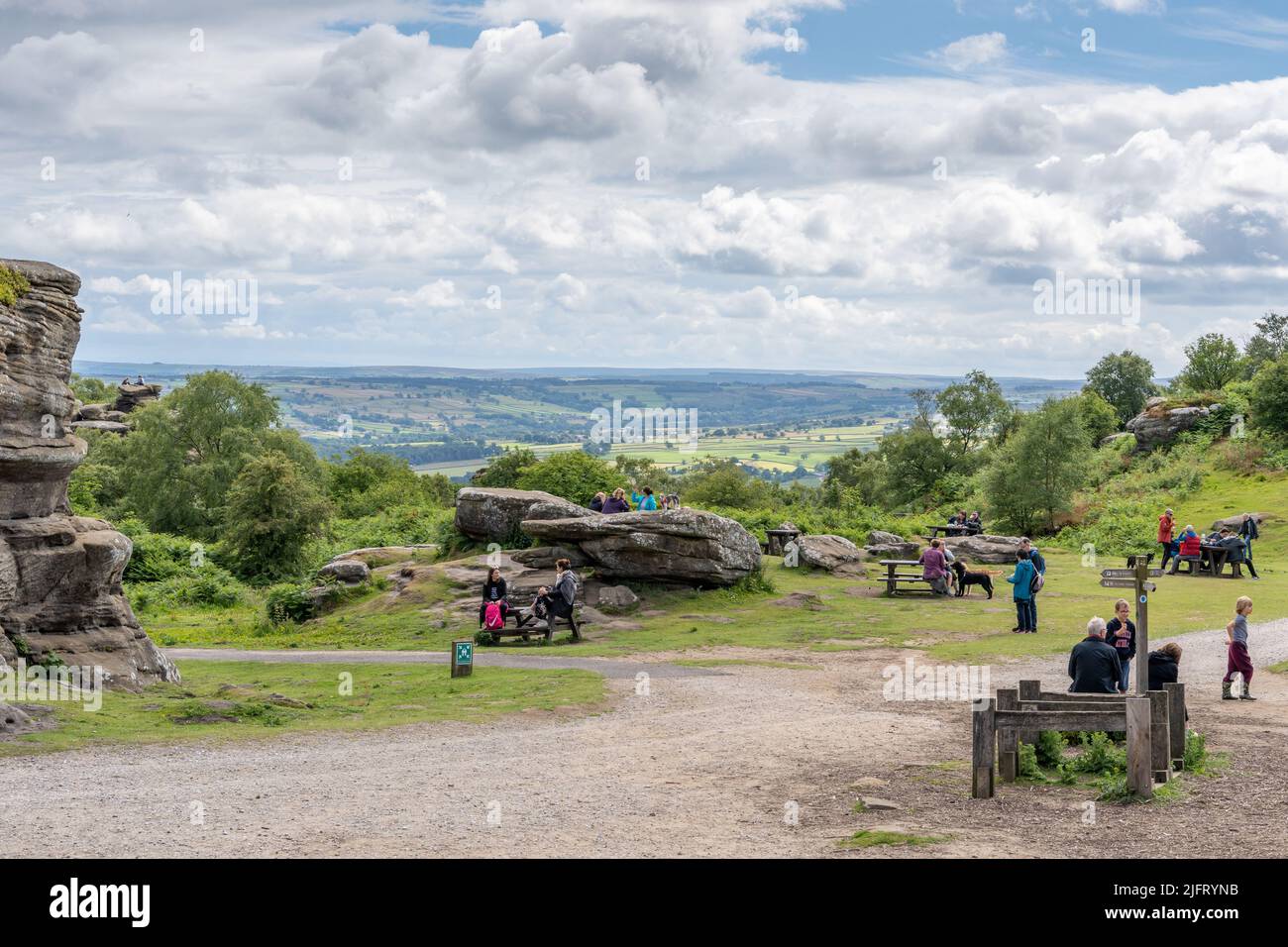 People enjoying a day out at Brimham Rocks, natural rock crag ...