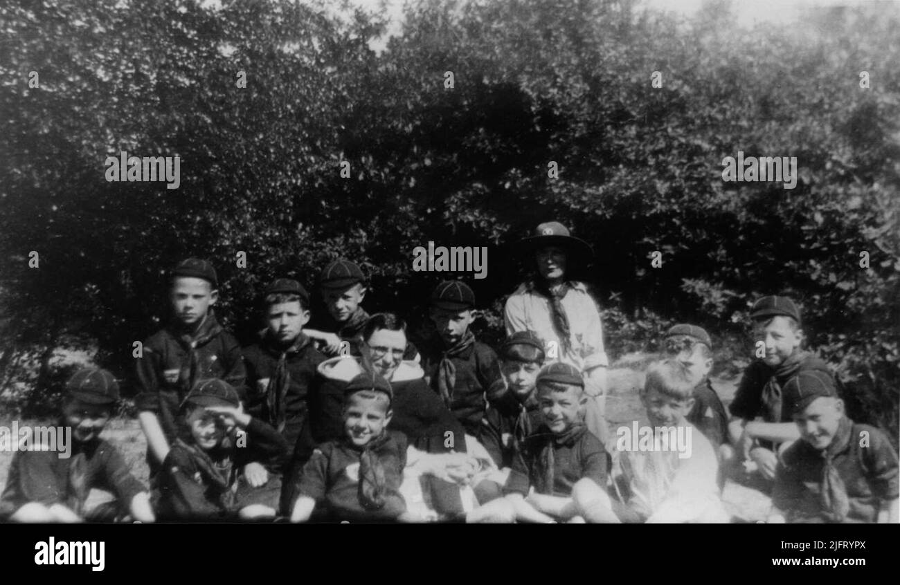 First cub group of the St. Albertus group with sitting Father Lemeer ...