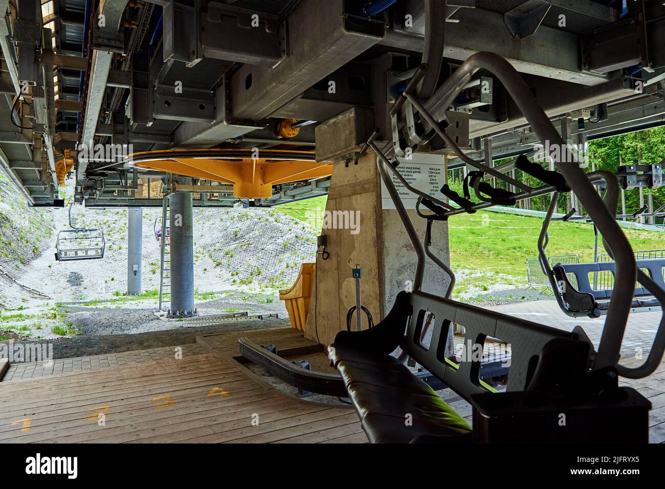 Open cable car line. Metal cable and moving rollers on platform for funicular mechanism, close ...