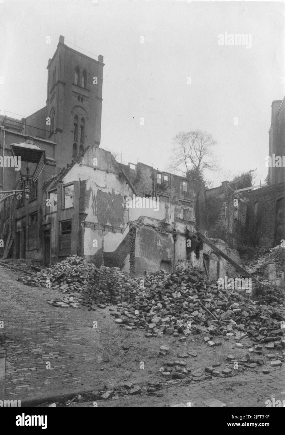 The demolition of a few buildings, seen from the Steenstraat, in the ...