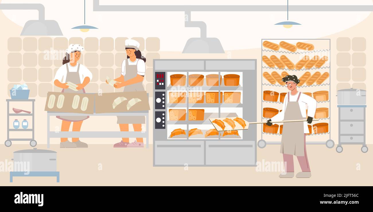 A bakery worker takes fresh baked goods from the oven while two chefs ...