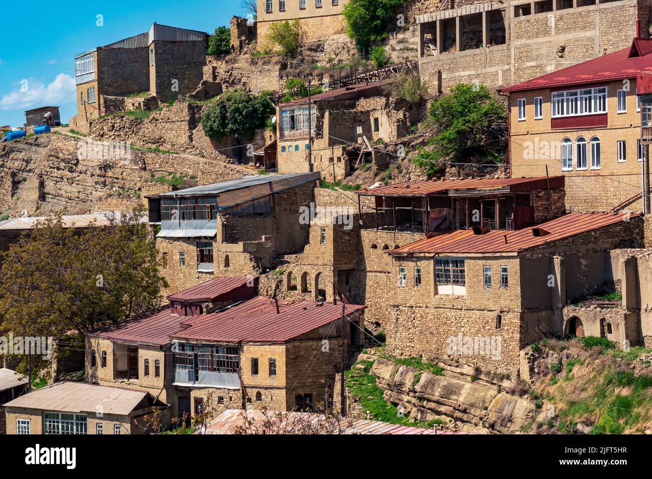 finished, under construction and destroyed houses of different times in ...