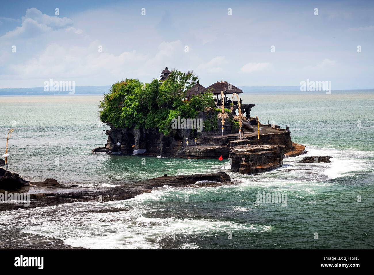 Tanah Lot is a rock formation and home to an ancient hindu pilgrimage ...