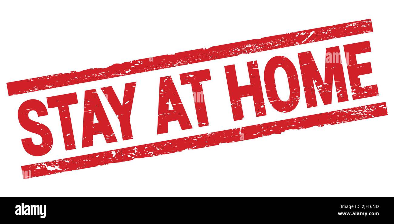STAY AT HOME text written on red rectangle stamp sign Stock Photo - Alamy