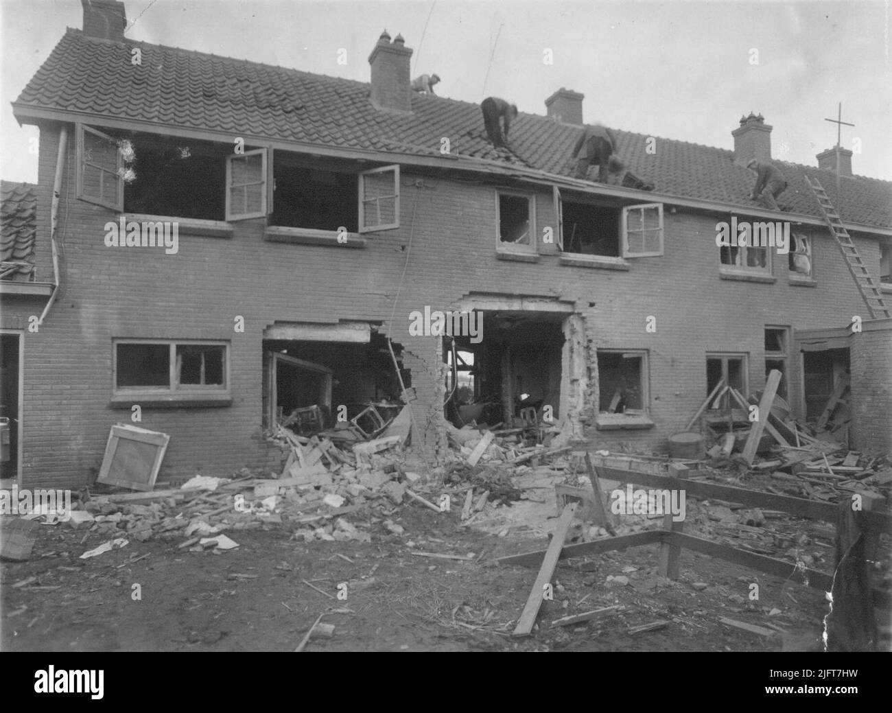 The buildings destroyed by a bomb explosion; A donation from Drs. Kokke ...