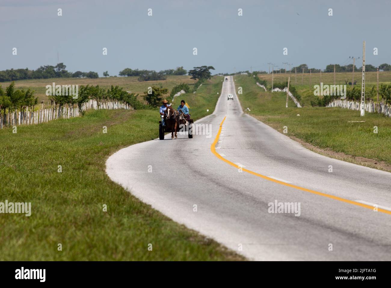 Cuba, typical landscape in Holguin province with long roads Stock Photo ...
