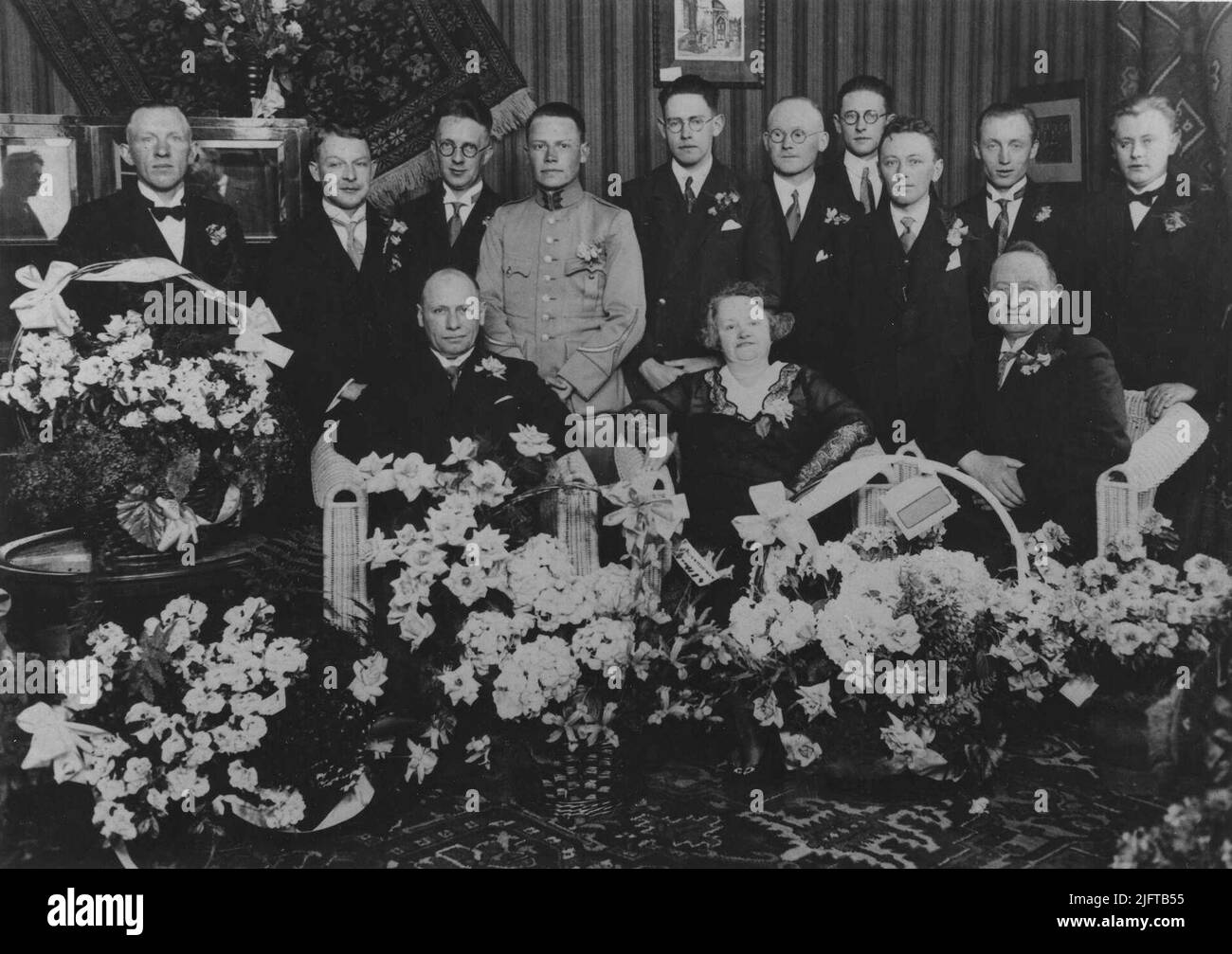 A 25-year anniversary of Mr. Rauch; Mr. Rauch amidst his wife and ...