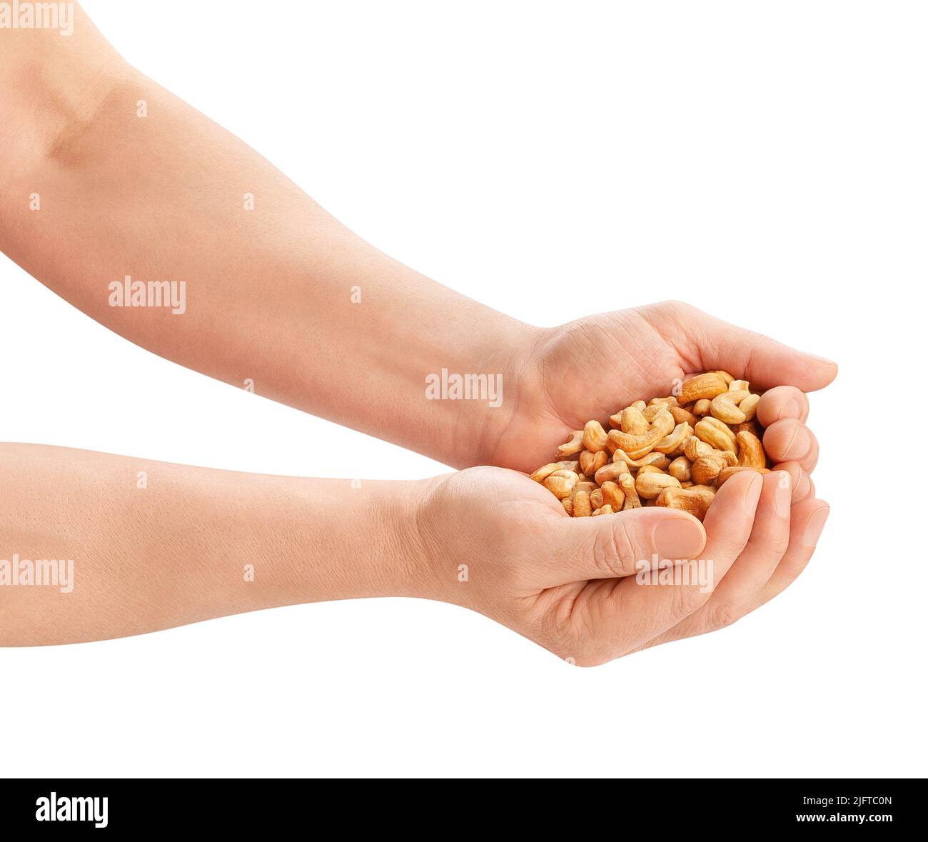 cashew nut in hand path isolated on white Stock Photo - Alamy