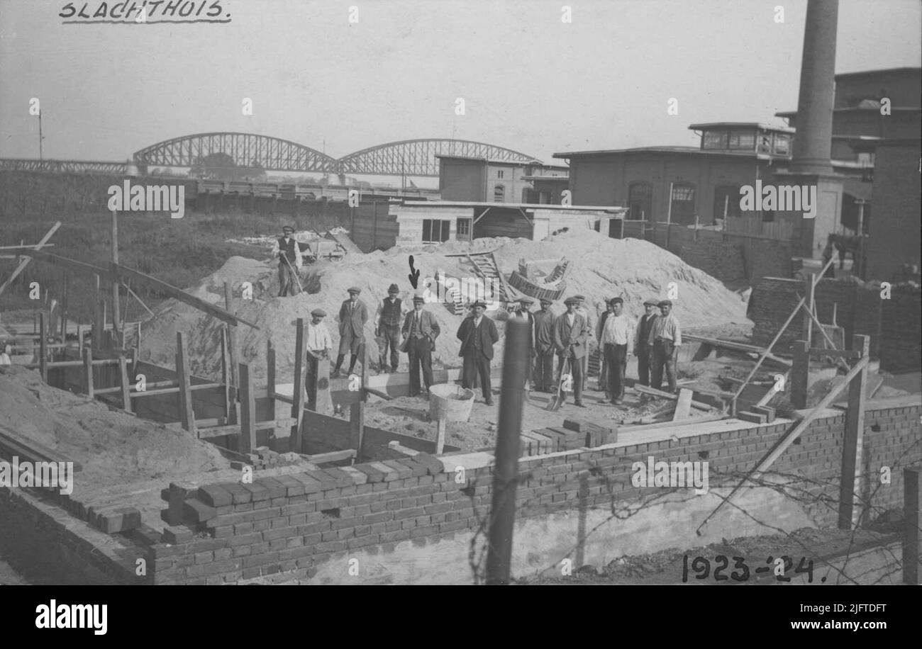 Construction workers, during the construction of the slaughterhouse ...