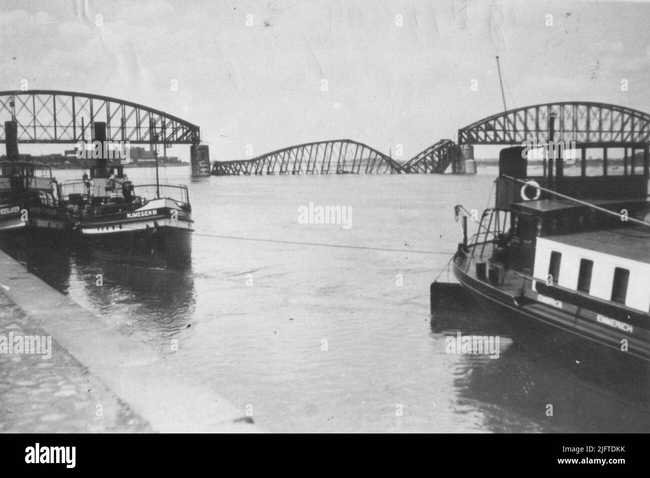 The blown -up middle arch of the railway bridge Stock Photo - Alamy