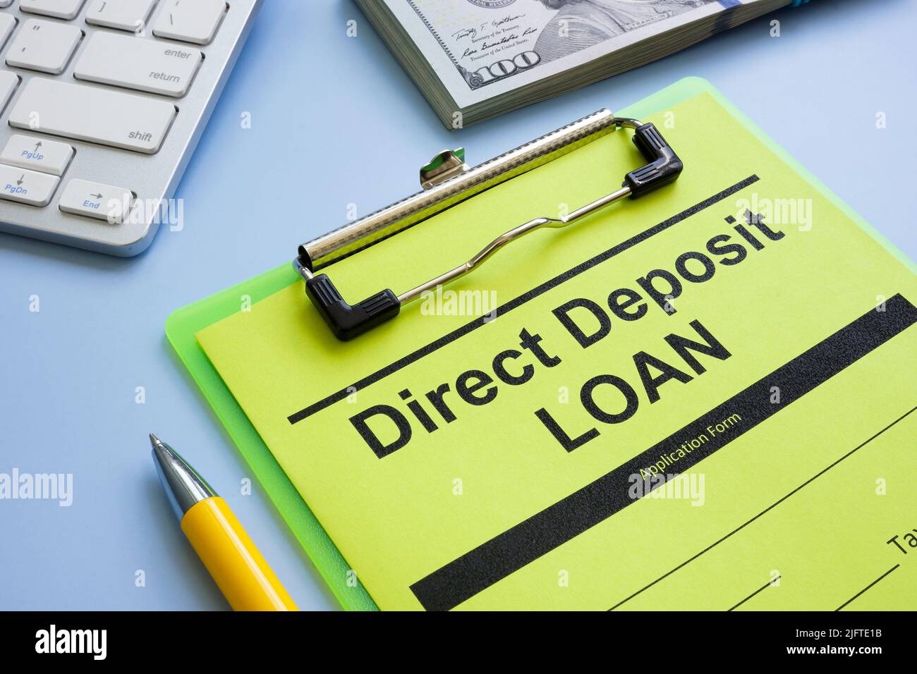 Direct deposit loan application form and pen Stock Photo - Alamy