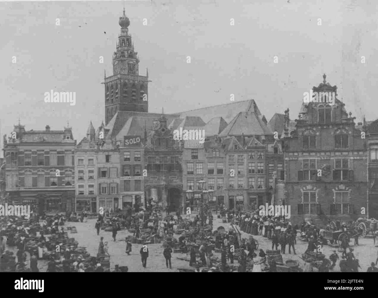 Market day, on the right is the Waaggebouw Stock Photo - Alamy