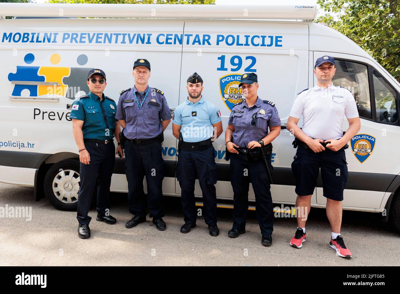 Split, Croatia, July 5, 2022. Croatian police officers walk with their ...
