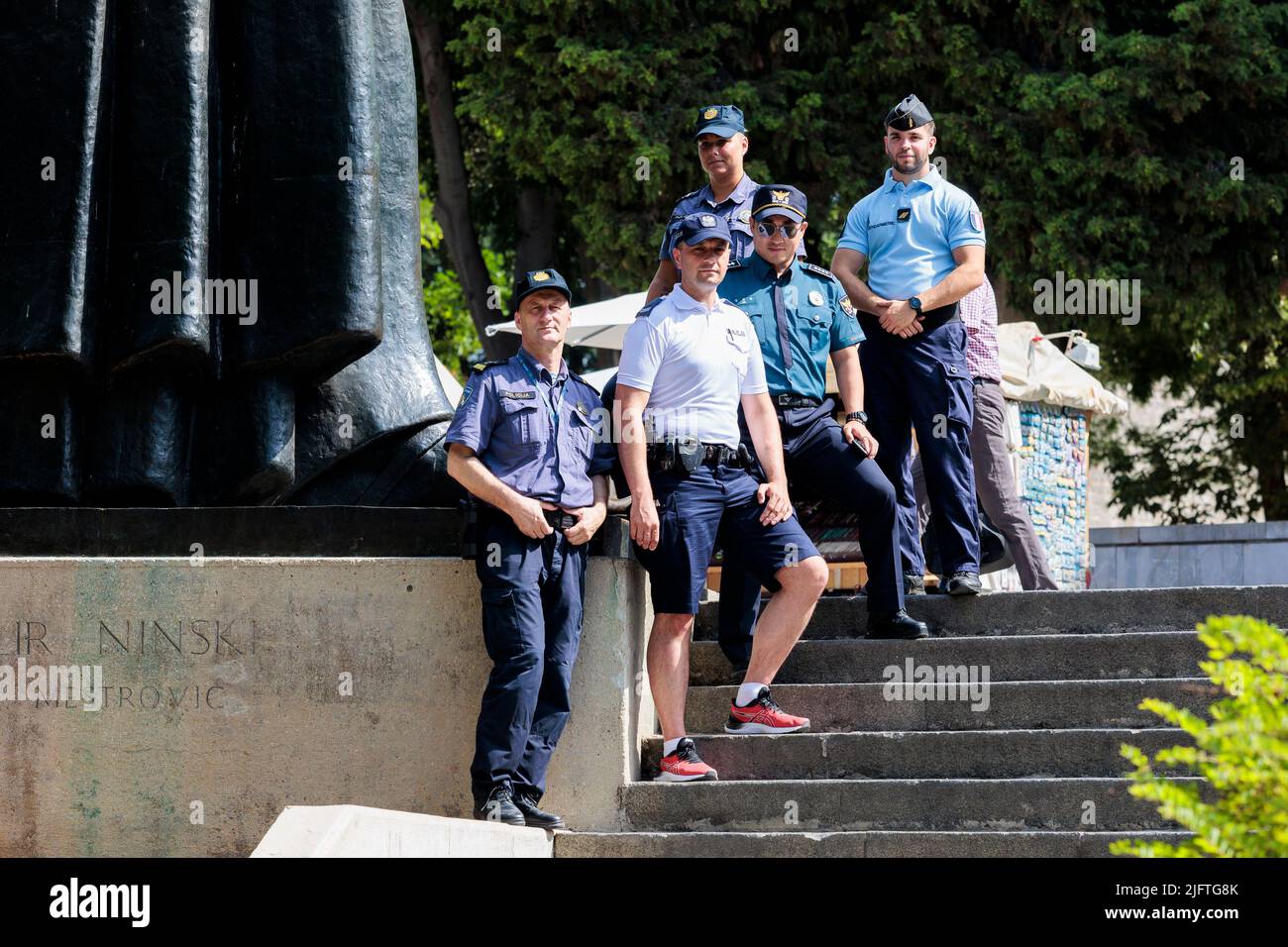 Split, Croatia, July 5, 2022. Croatian police officers walk with their ...