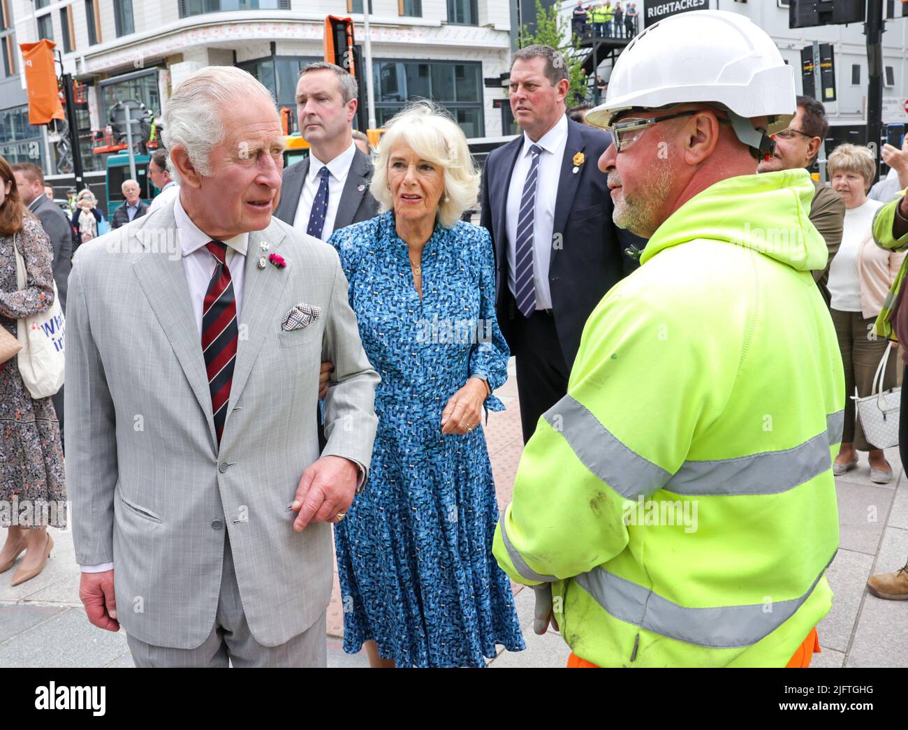 The Prince of Wales and the Duchess of Cornwall speak with construction ...