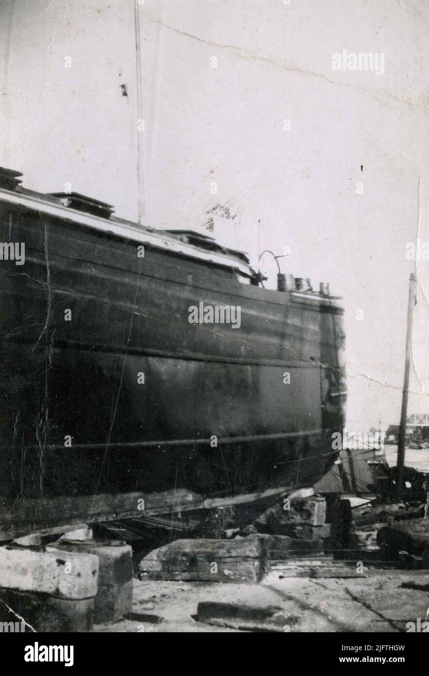 An inland navigation vessel, a so -called striker, on the slope of ...