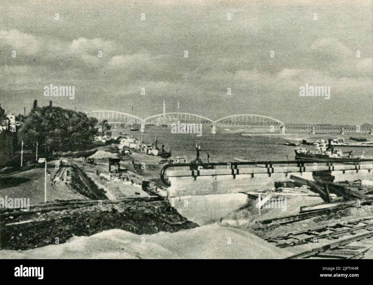 Waalkade with railway bridge from the Waalbrug under construction Stock ...