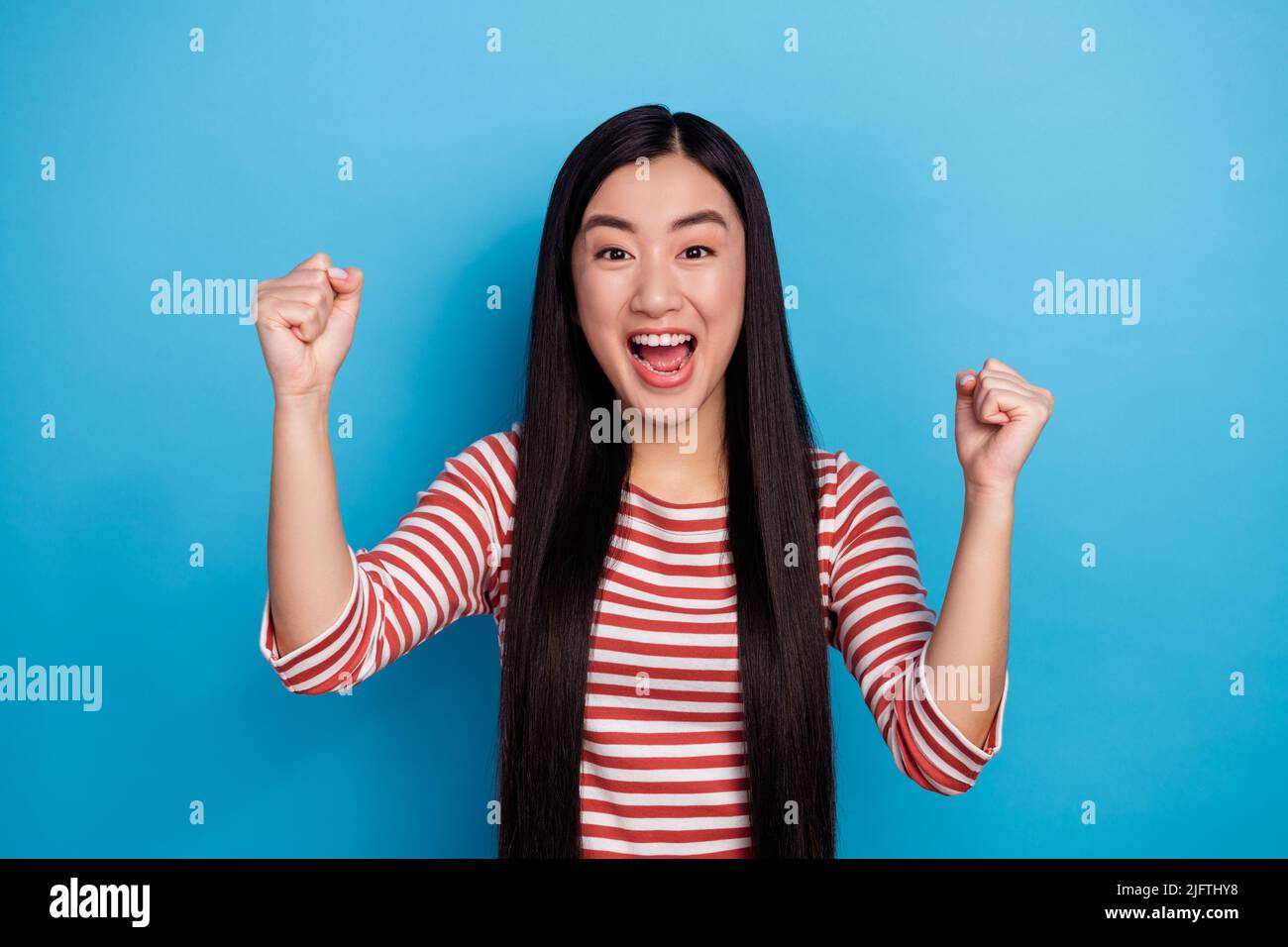 Photo of overjoyed astonished thai person raiser fists scream yes ...