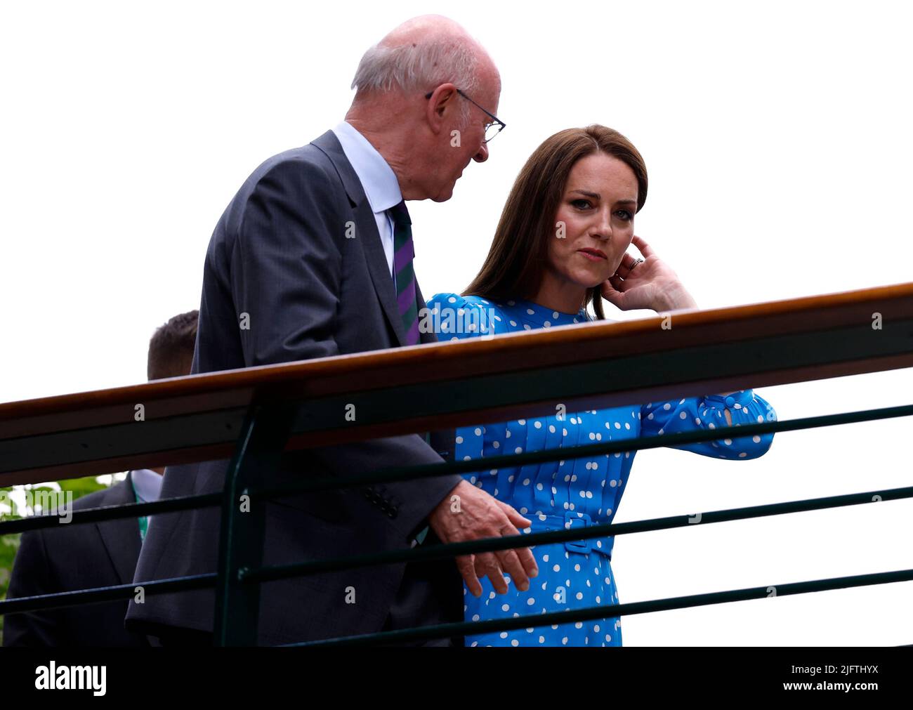 The Duchess of Cambridge crosses the bridge with AELTC chairman Ian ...