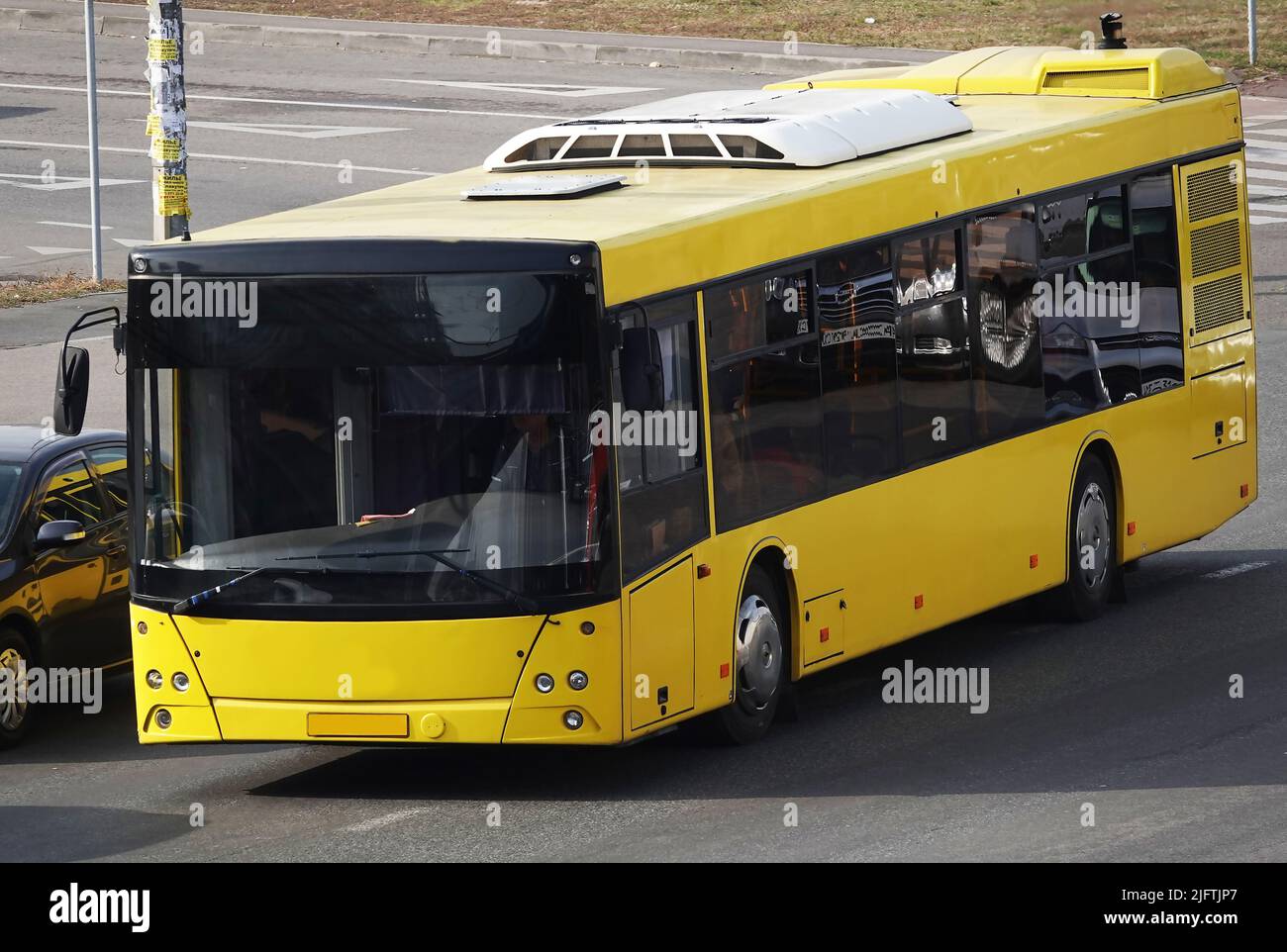 Kyiv, Ukraine October 14, 2021: yellow big bus moves on the road in the ...