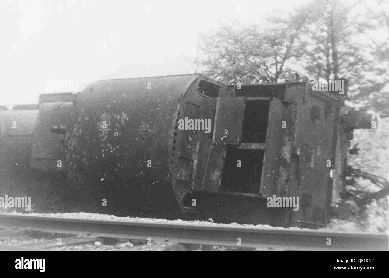 Disrupted locomotive of the German armor train near Mill Stock Photo ...