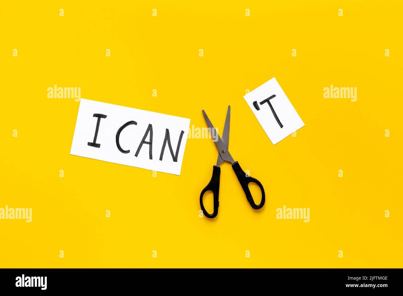 I can do it concept. Words I cannot become I can with scissors Stock Photo - Alamy
