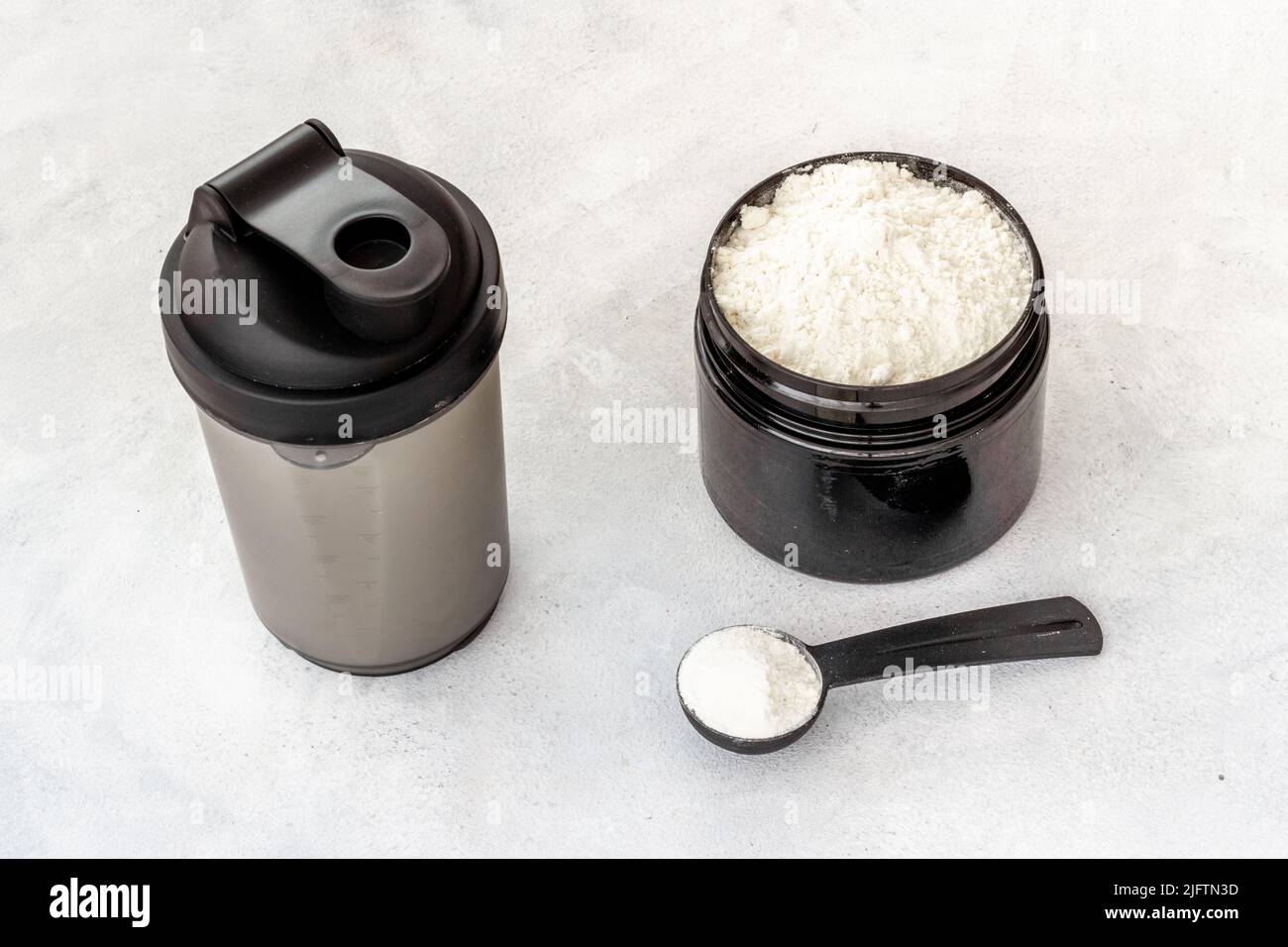 Sport bottle with protein shake and whey protein powder. Sport food ...