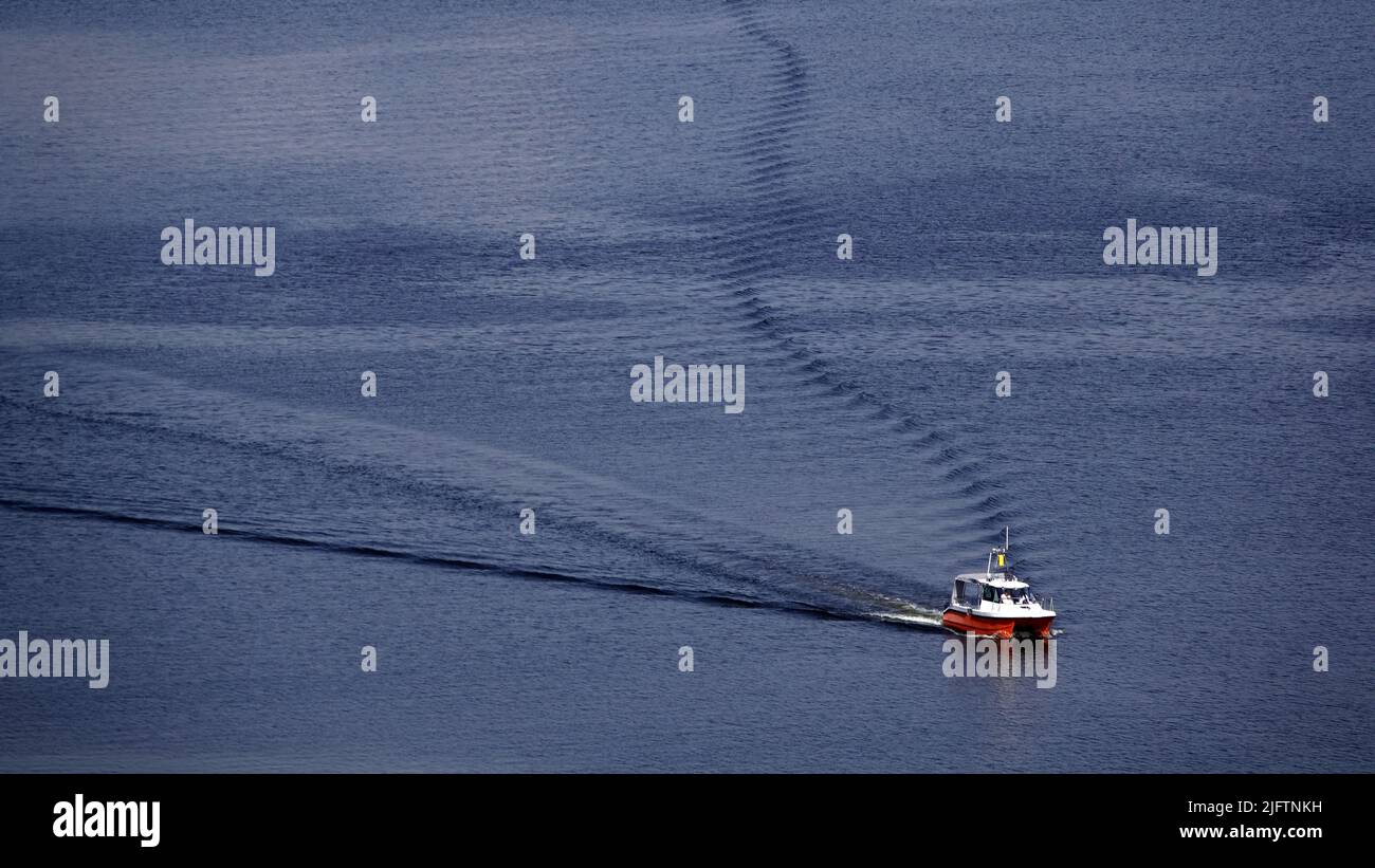 Up The ship floats on the river making long waves Stock Photo - Alamy
