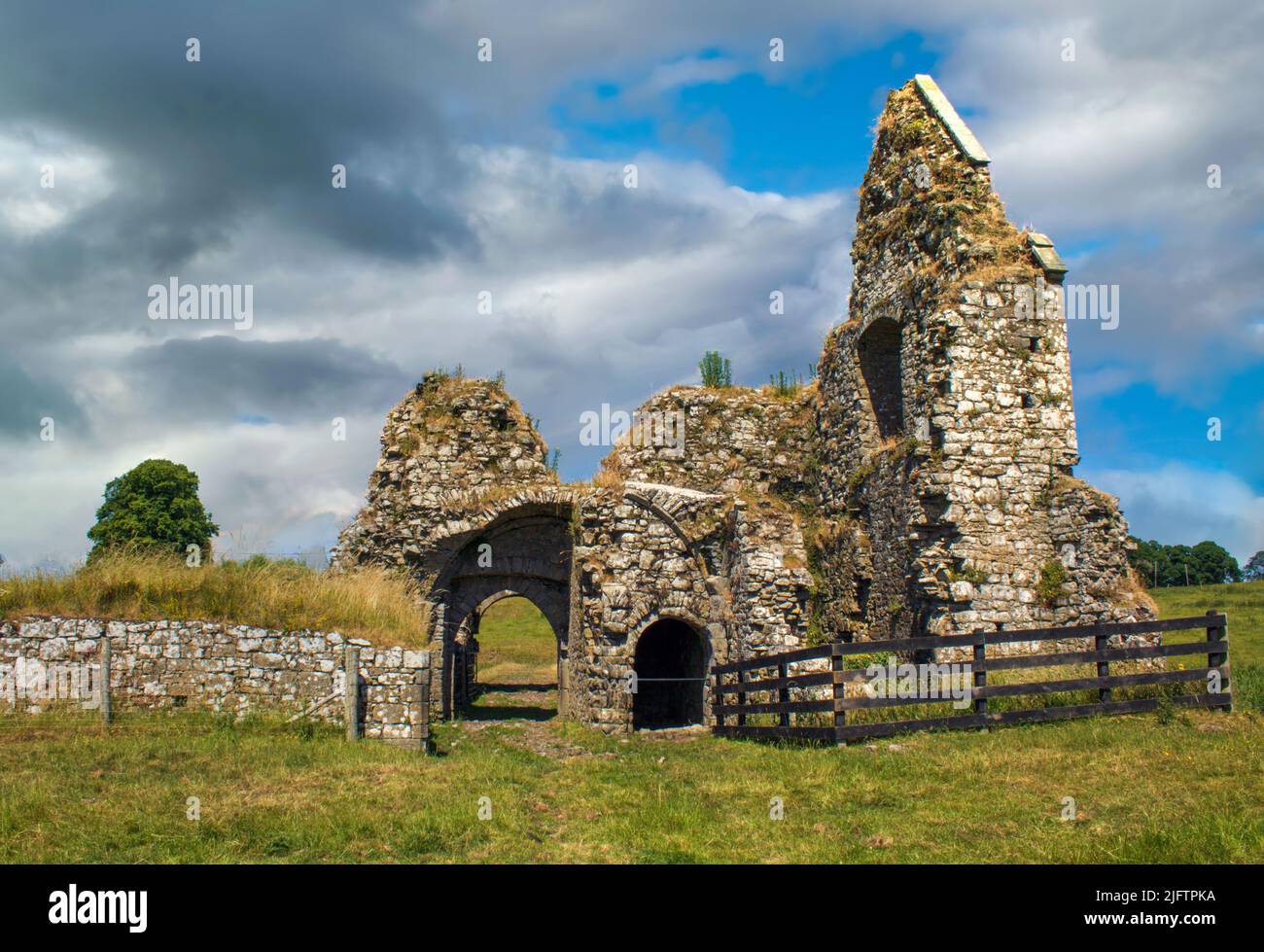 Entrance to now abandoned and ruined medieval Athassel Abbey in County ...