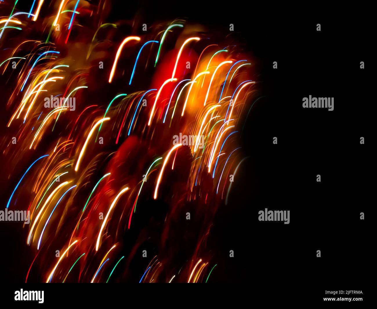 Neon light rays flash and glow on black. Light streaks electric color ...