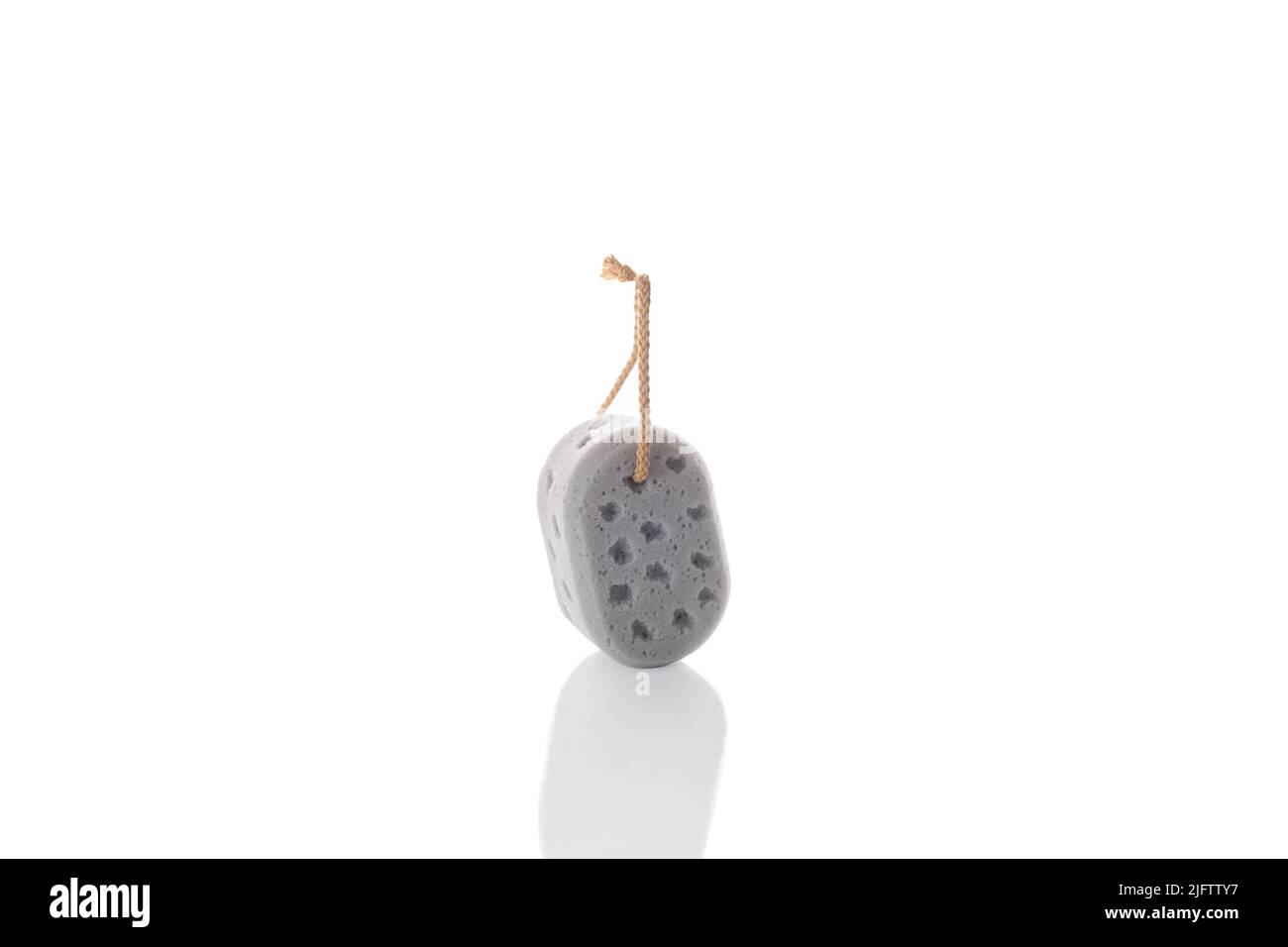 new grey sponge on white background Stock Photo - Alamy