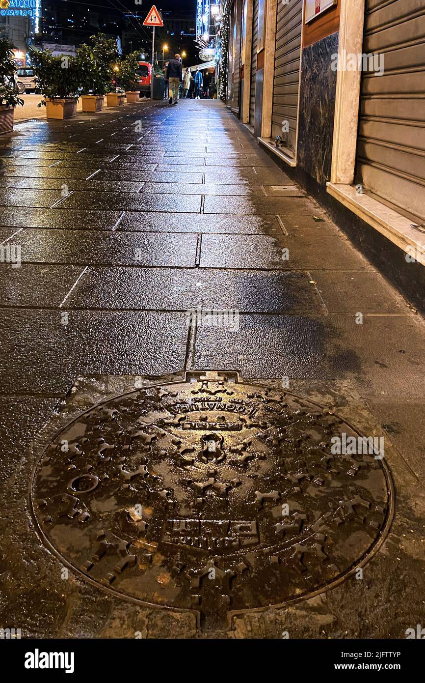 Antique manhole cover in the via Balbi in Genoa Stock Photo - Alamy