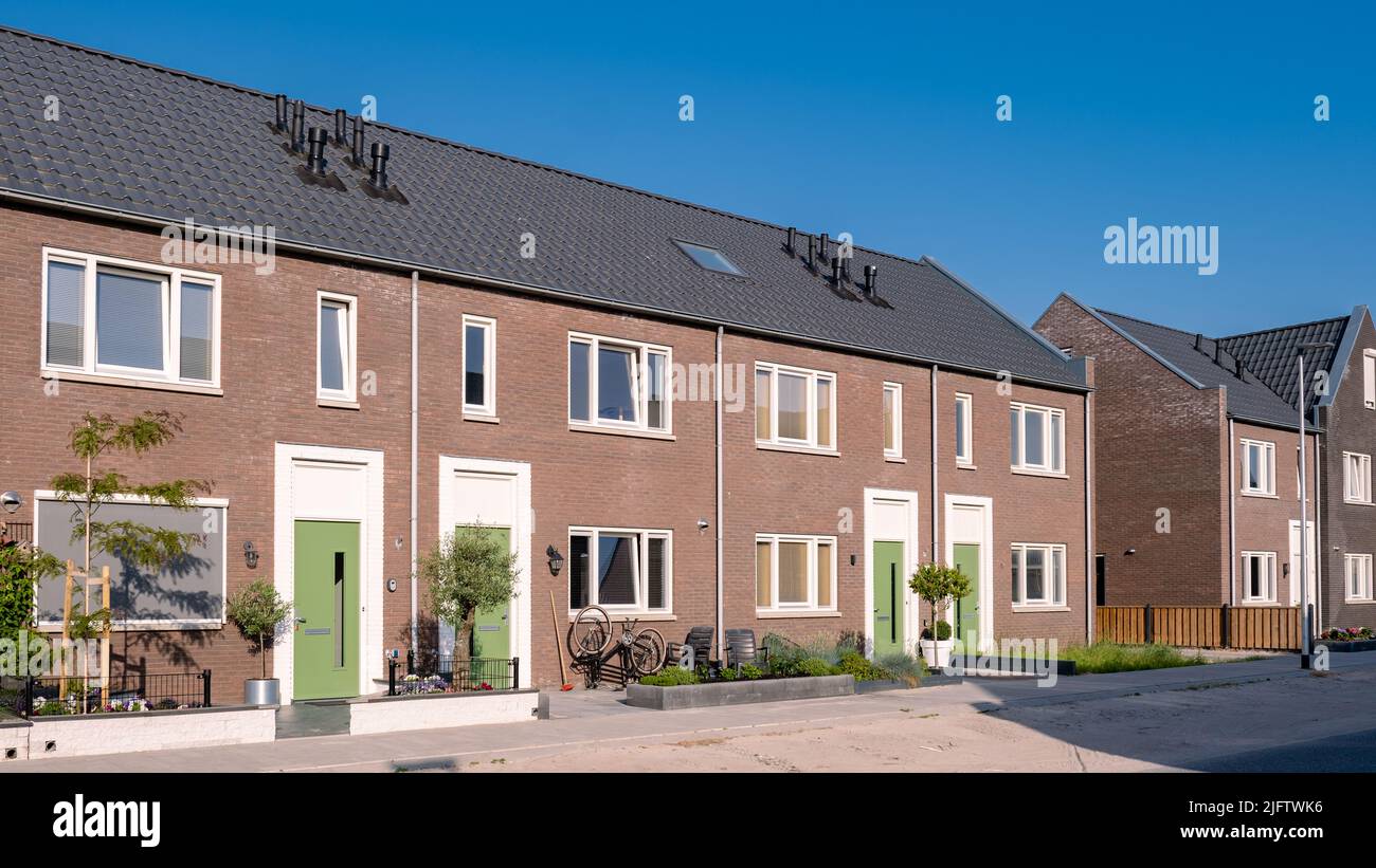 Dutch Suburban area with modern family houses, newly build modern ...