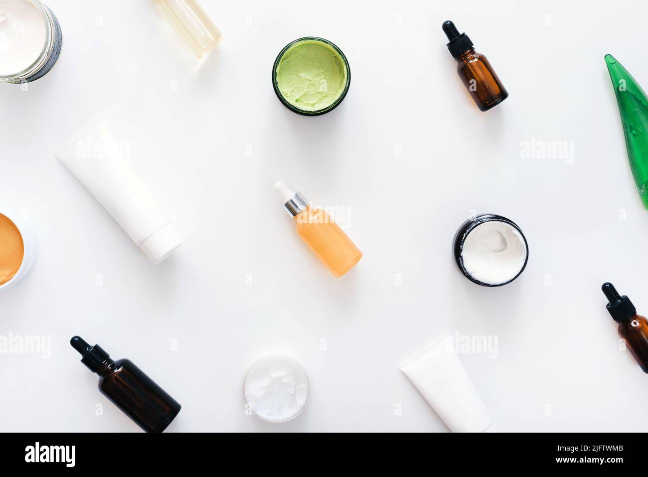 Top view layout of face and body skin care products. A variety of ...
