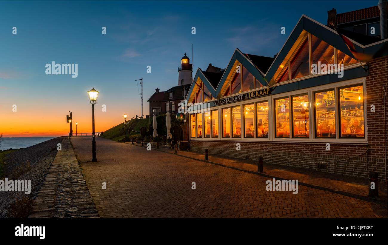 Urk Flevoland Netherlands June 2020 sunset at the lighthouse and harbor ...