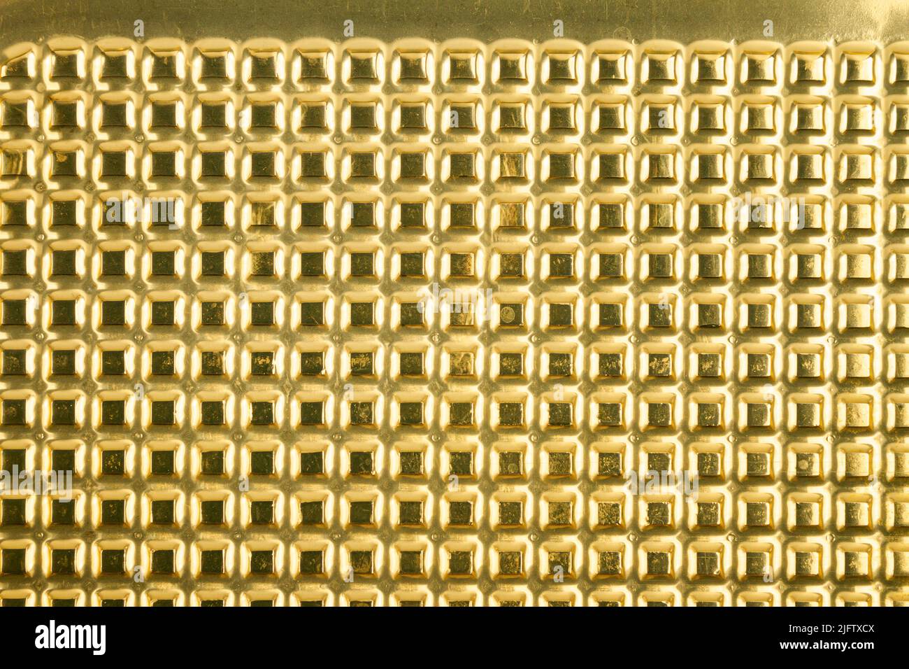 Golden plastic packaging food tray texture background Stock Photo - Alamy