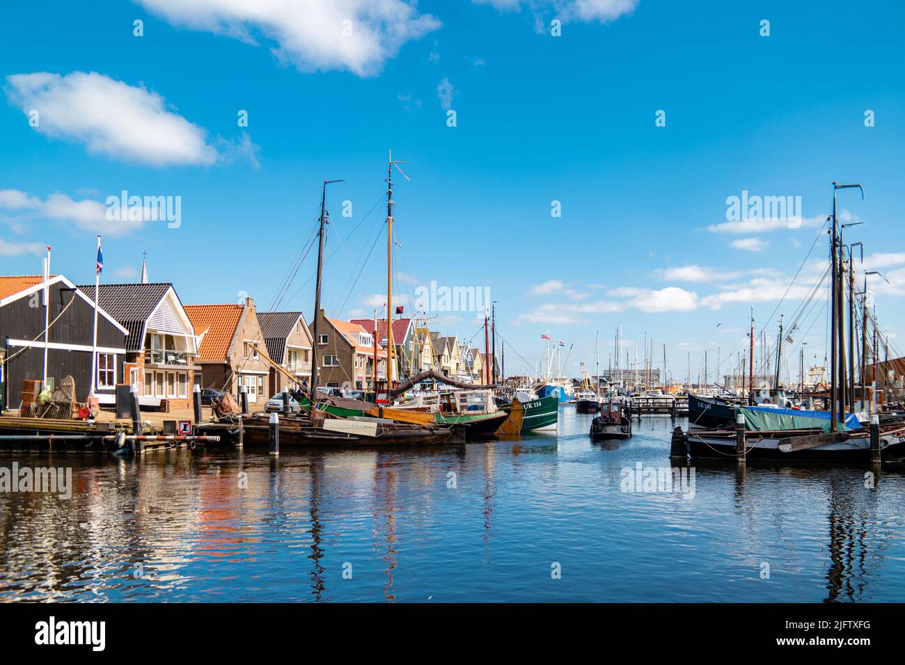 Urk Flevoland Netherlands June 2020 sunset at the lighthouse and harbor ...