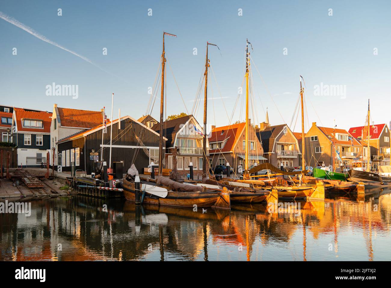 Urk Flevoland Netherlands June 2020 sunset at the lighthouse and harbor ...