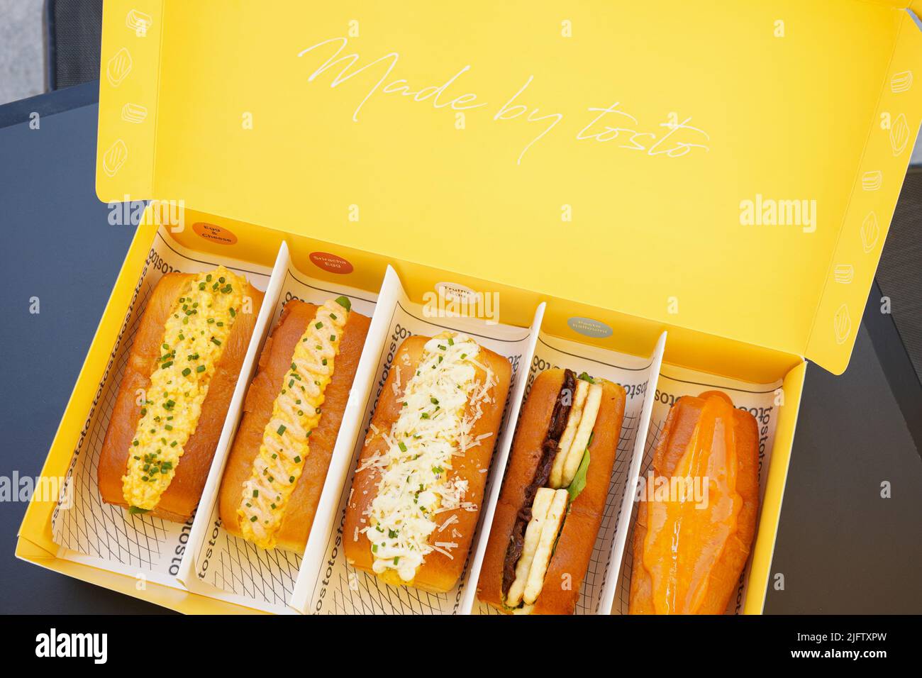 Yellow food box hi-res stock photography and images - Alamy