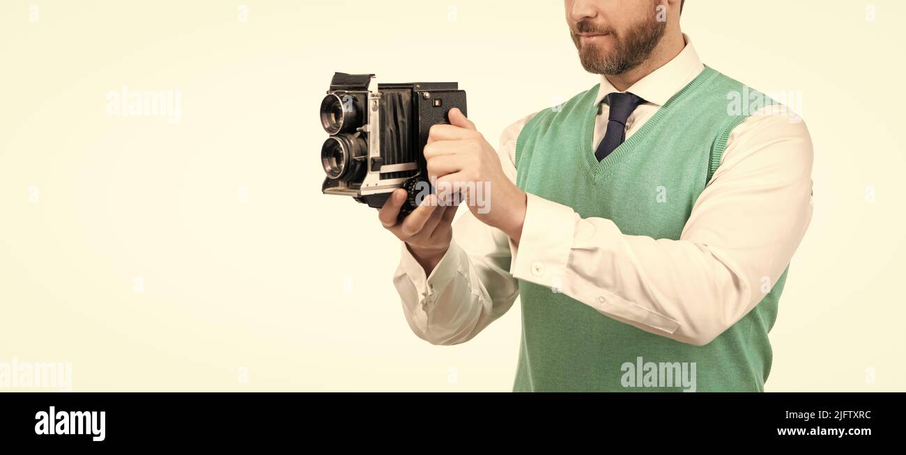 cropped man making photo with retro camera isolated on white background ...