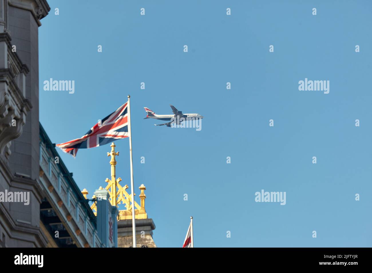 British Airways plane flying over Tower Bridge, London, UK Stock Photo ...
