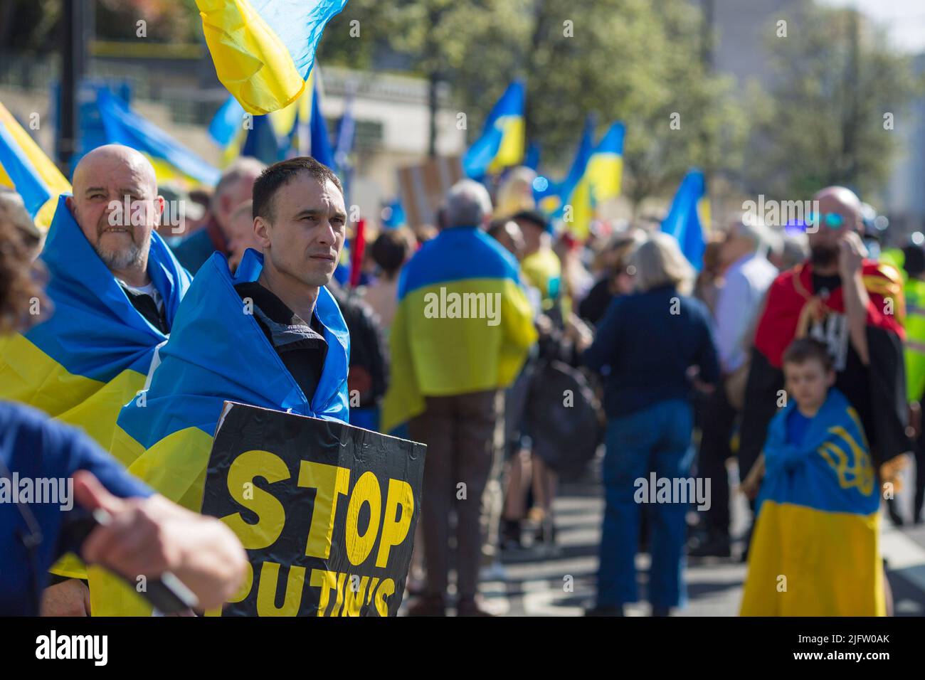 People gather during the ‘London Stands with Ukraine’ march to show ...