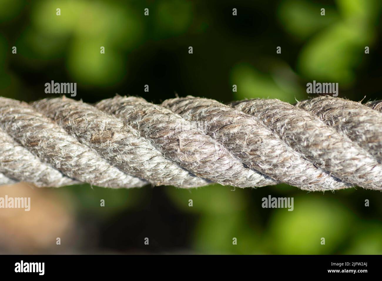 thick braided rope near, fiber rope Stock Photo - Alamy
